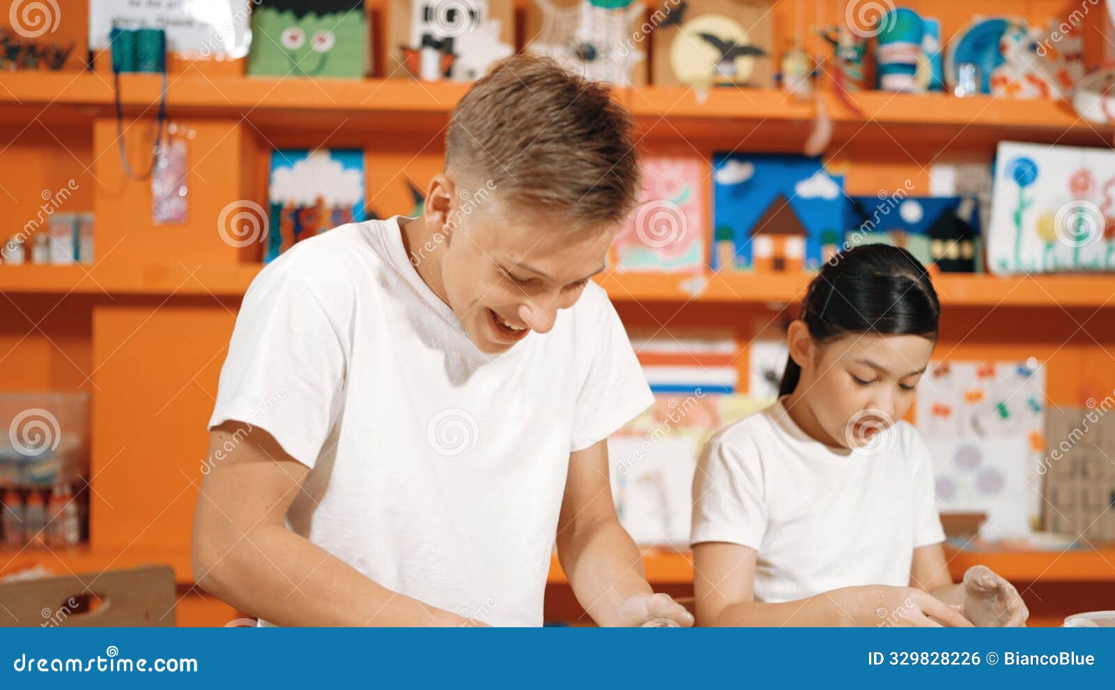 Smart Student Using Hand Press on Clay Piece at Pottery Workshop ...