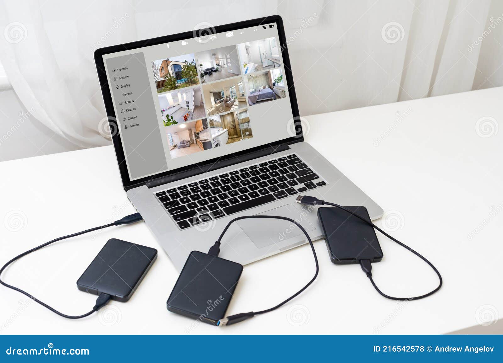 Smart Home Automation App Interface on Laptop To Control House with ...