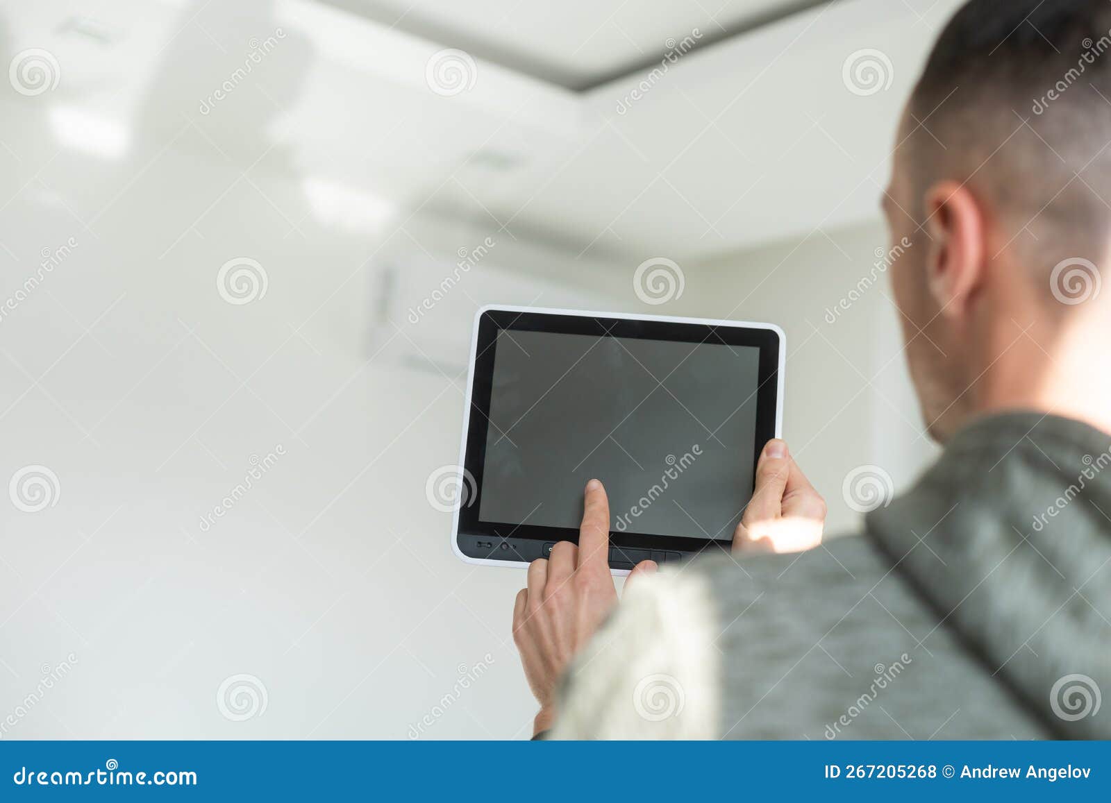 Smart Home Control on Tablet. Interior of Living Room in the Background ...