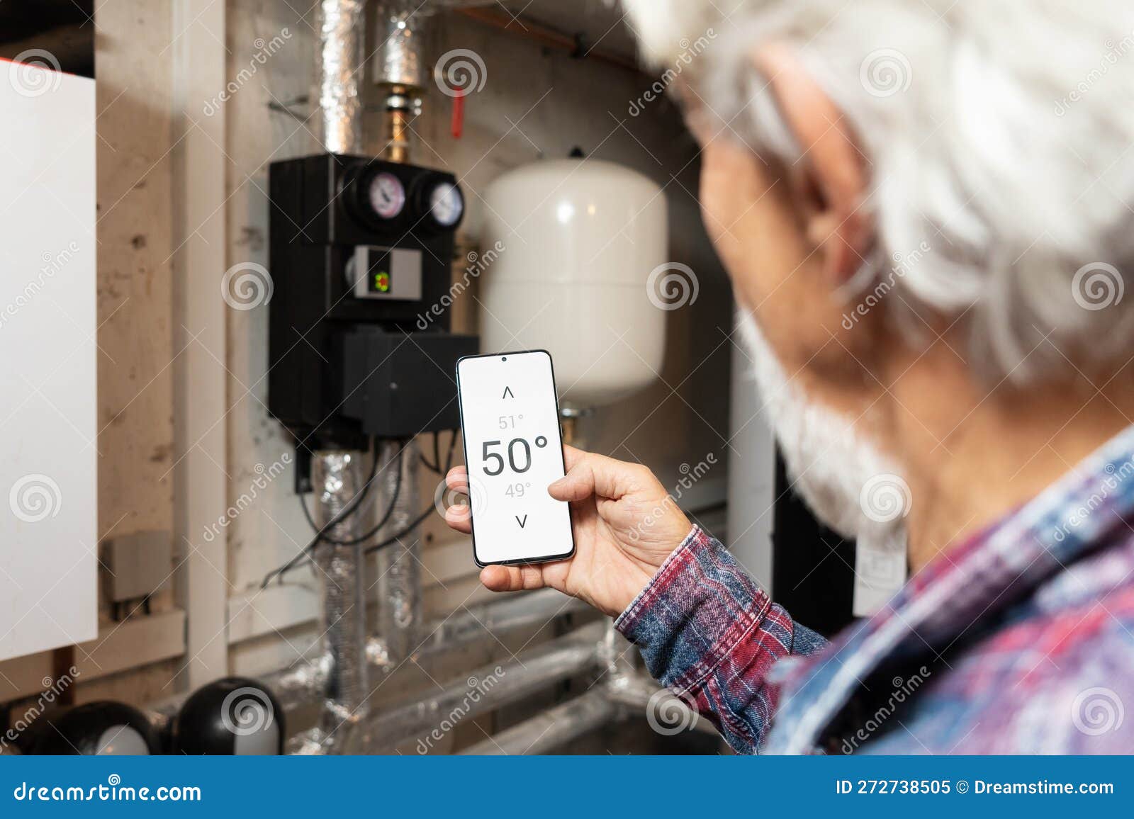 Smart Home: Man Controlling Heating Using App Stock Image - Image of ...