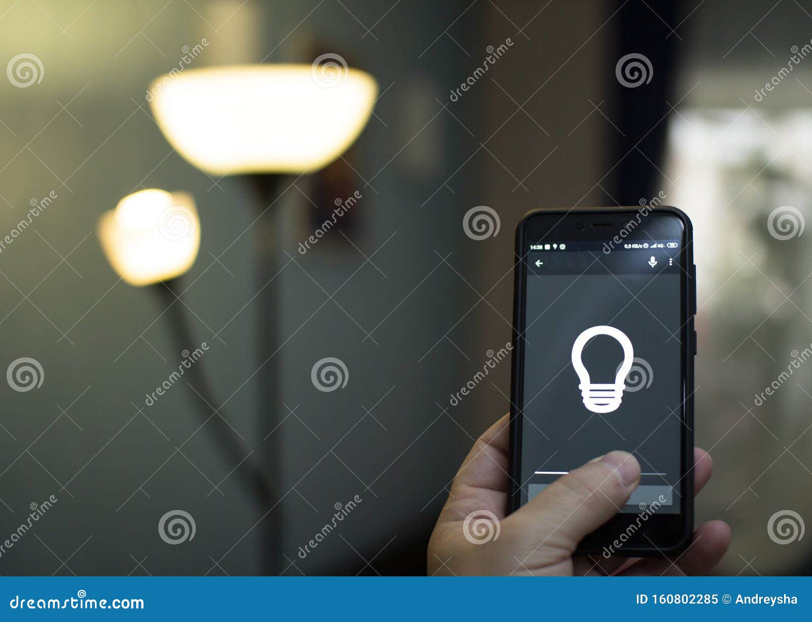 Smart Home: Man Controlling Lights with App on His Phone Stock Image ...
