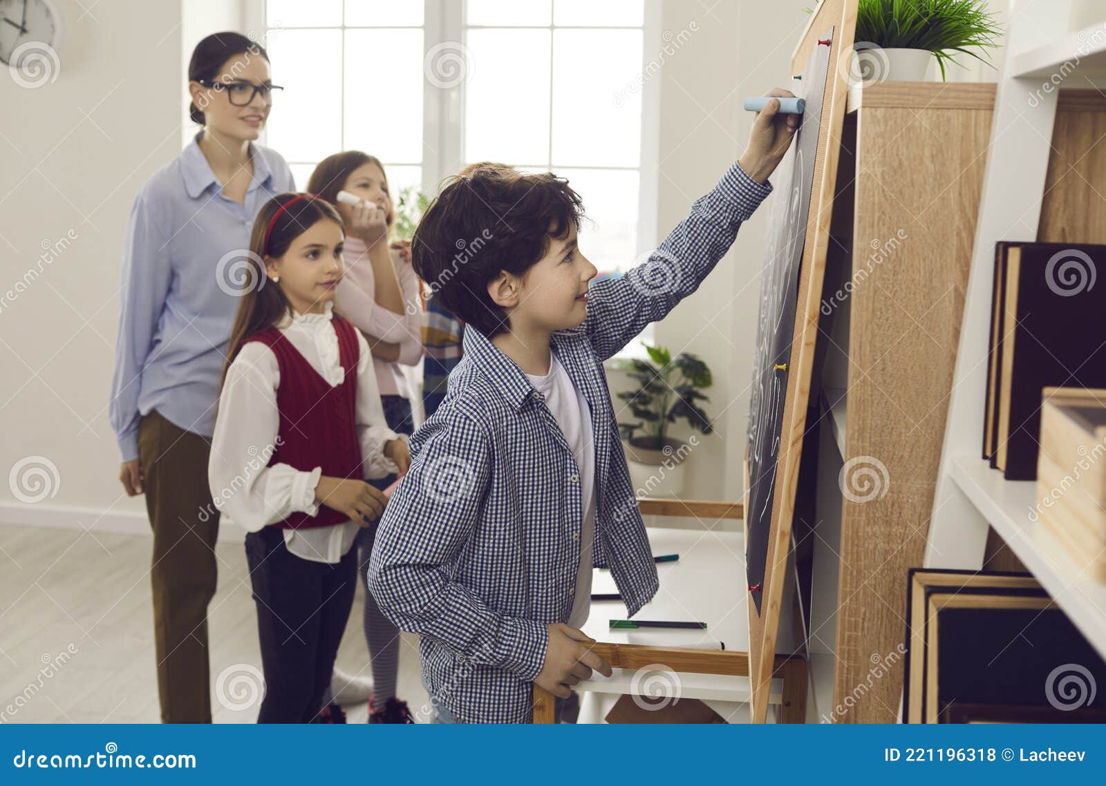 Smart Intelligent Kid Boy Answering at Classroom Board during School ...