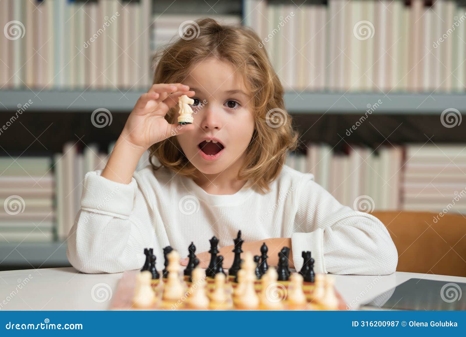 Smart Kid Playing Chess. Clever Child Thinking about Chess. Stock Image ...