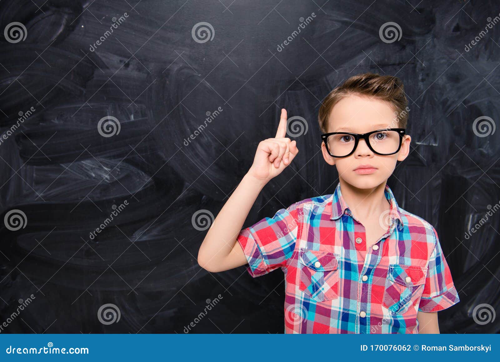 Smart Little School Boy in Glasses Having an Idea Stock Photo - Image ...