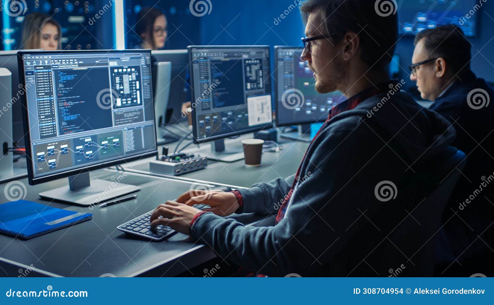 Smart Male it Programer Working on Desktop Green Mock-up Screen ...