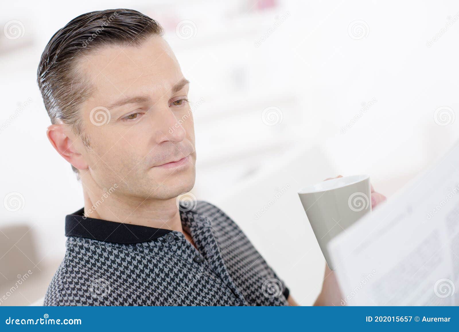 Smart Man Sat Holding Cup and Reading Newspaper Stock Image - Image of ...