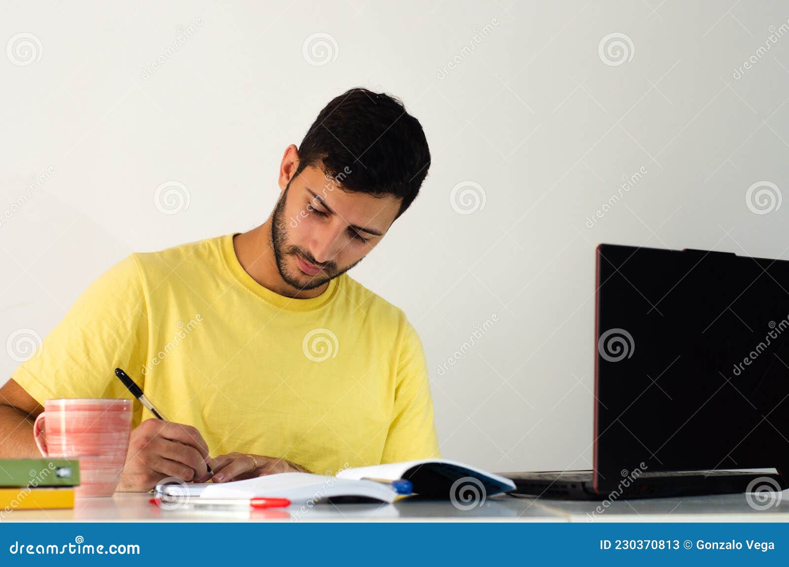 Smart Man Watching a Virtual Classroom from Home. Young Man Watching ...