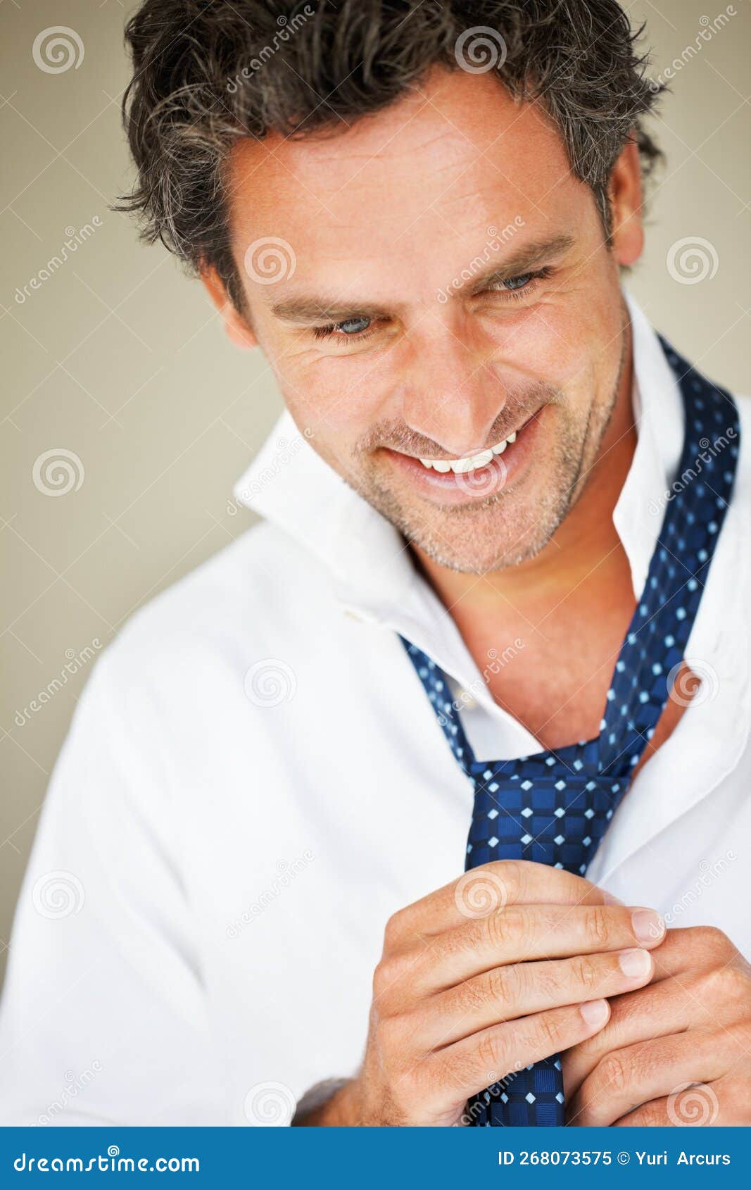 Smart Man Wearing Tie. Closeup of Smart Man Wearing Tie and Smiling ...