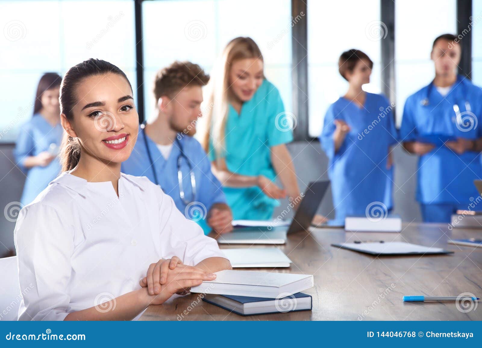 Smart Medical Student with Her Classmates Stock Photo - Image of health ...