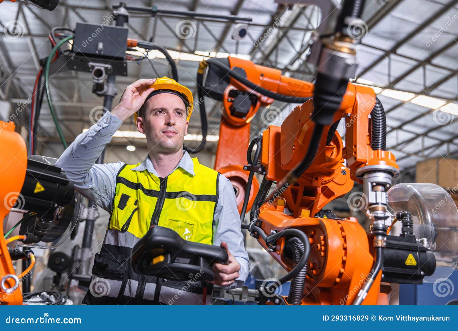 Smart Modern Engineer Male Using Modern Robot Technology. Robotic ...