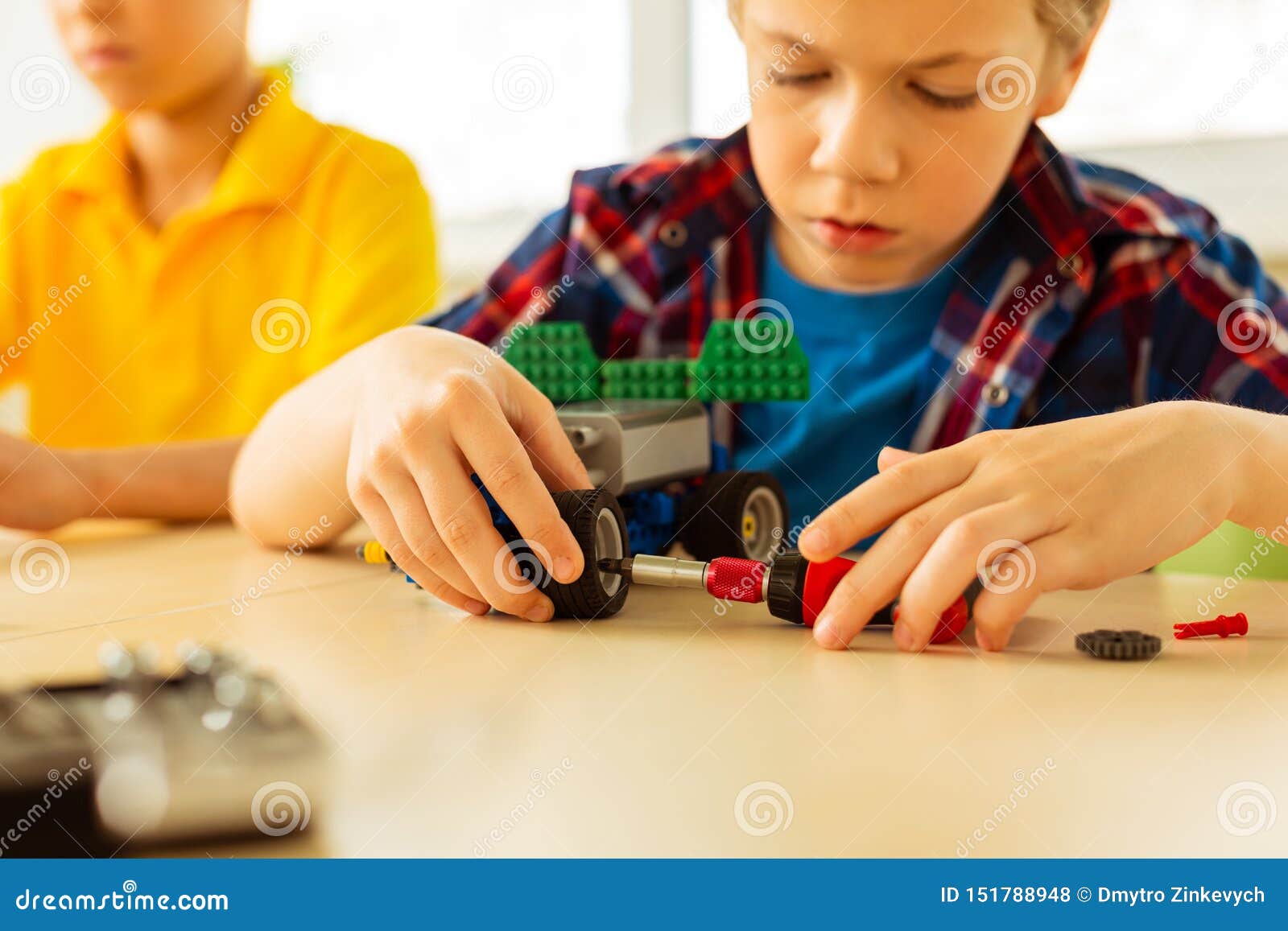 Smart Nice Boy Putting Car Details Together Stock Photo - Image of ...