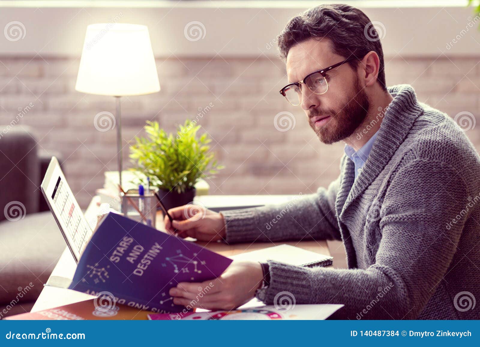 Smart Nice Man Reading a Book about Astrology Stock Photo - Image of ...