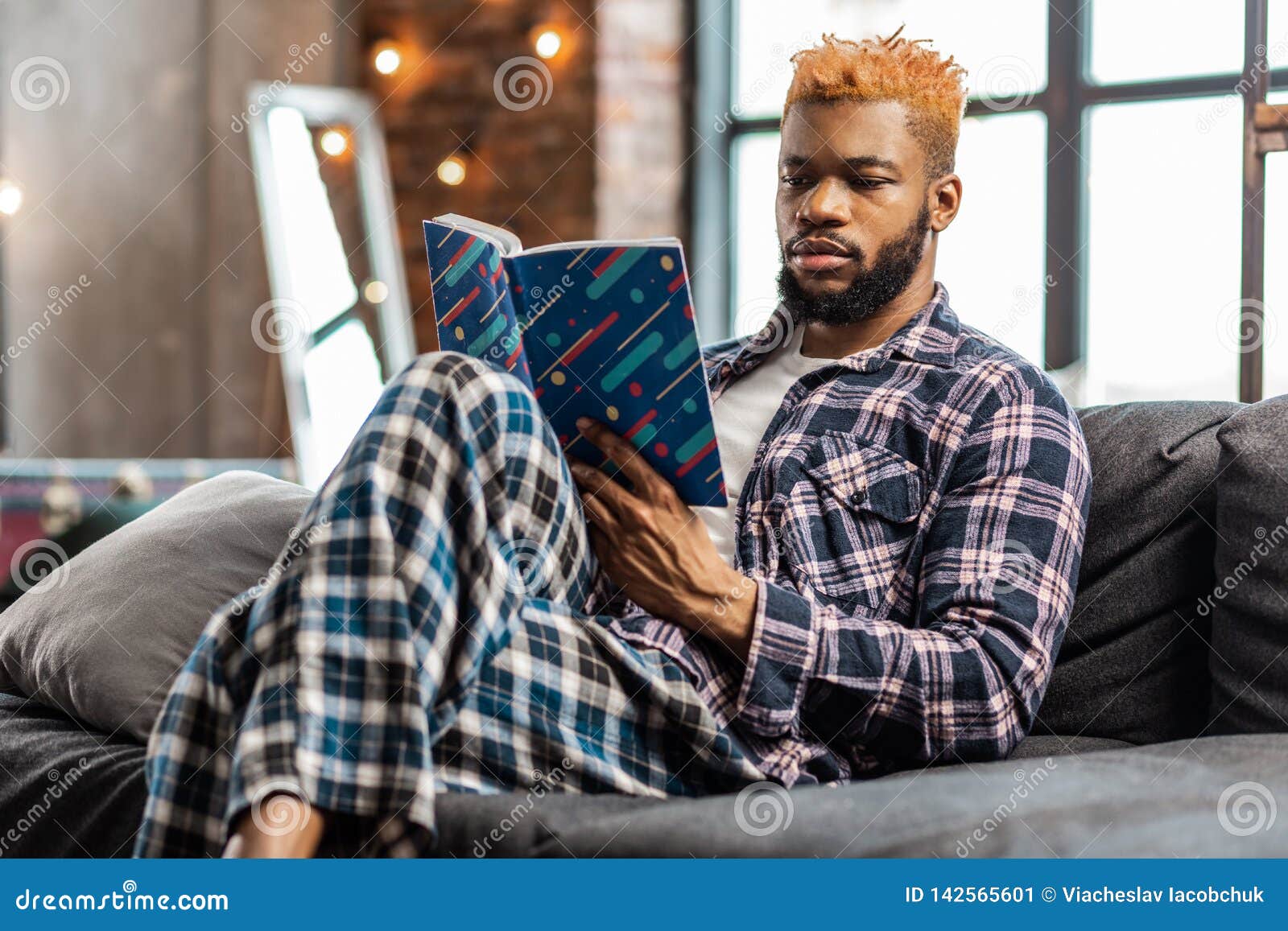 Smart Nice Man Resting at Home with a Book Stock Image - Image of male ...