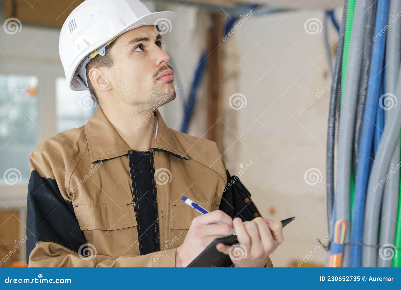 Smart Pensive Builder Thinking about Something Indoors Stock Image ...