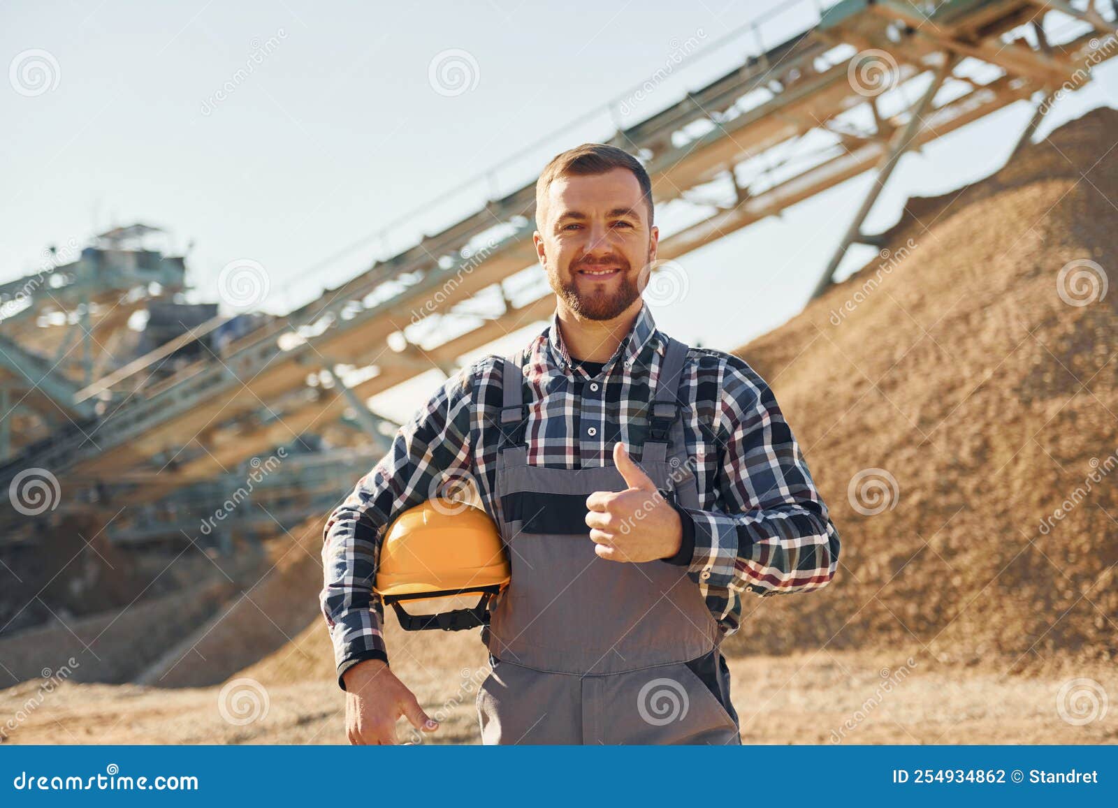 Smart Person. Construction Worker in Uniform is on the Quarry Stock ...