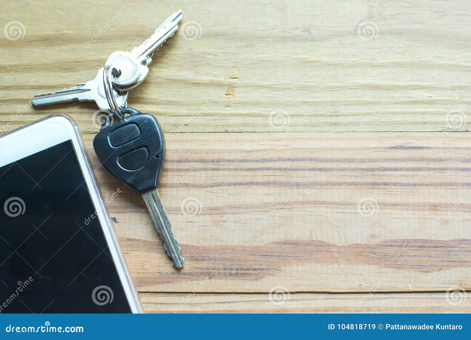 Smart Phone, Car Remote Key and Keys on the Wooden Background Stock ...