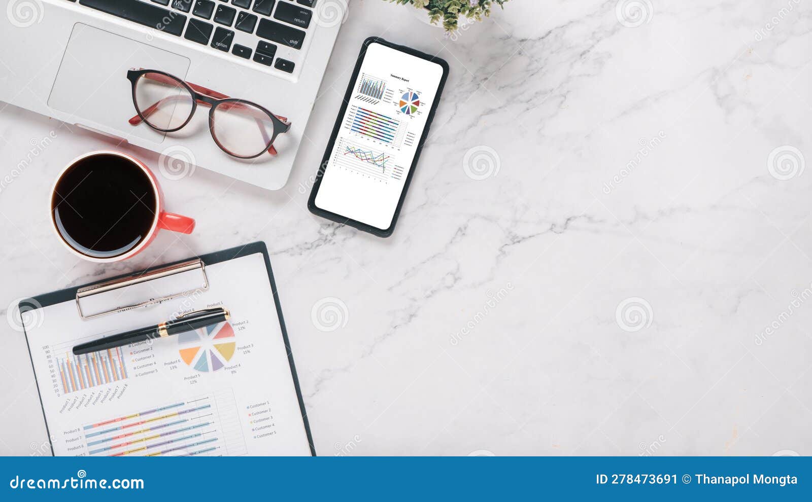 Smart Phone with Charts and Reports on Office Desk Workplace. Stock ...