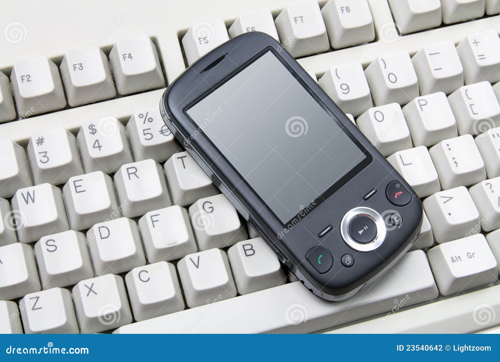 Smart Phone on Computer Keyboard Stock Photo - Image of connection ...