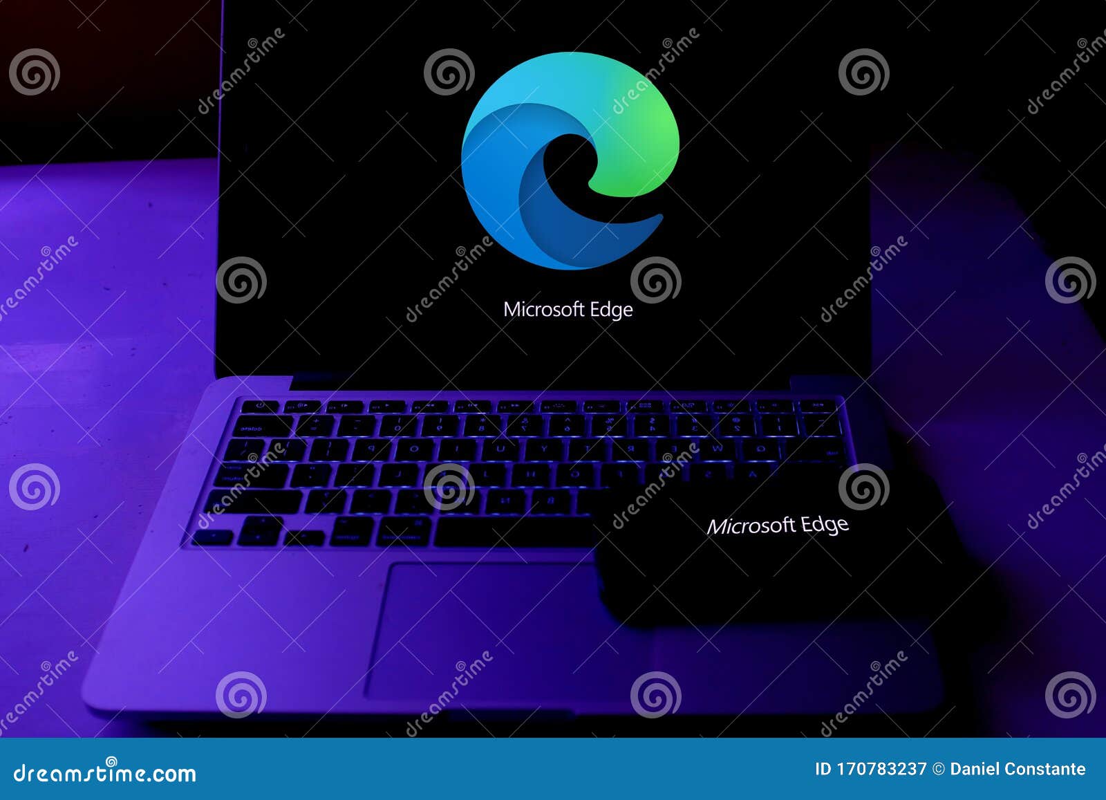 Smart Phone and Computer with the New Microsoft Edge Logo Based on ...