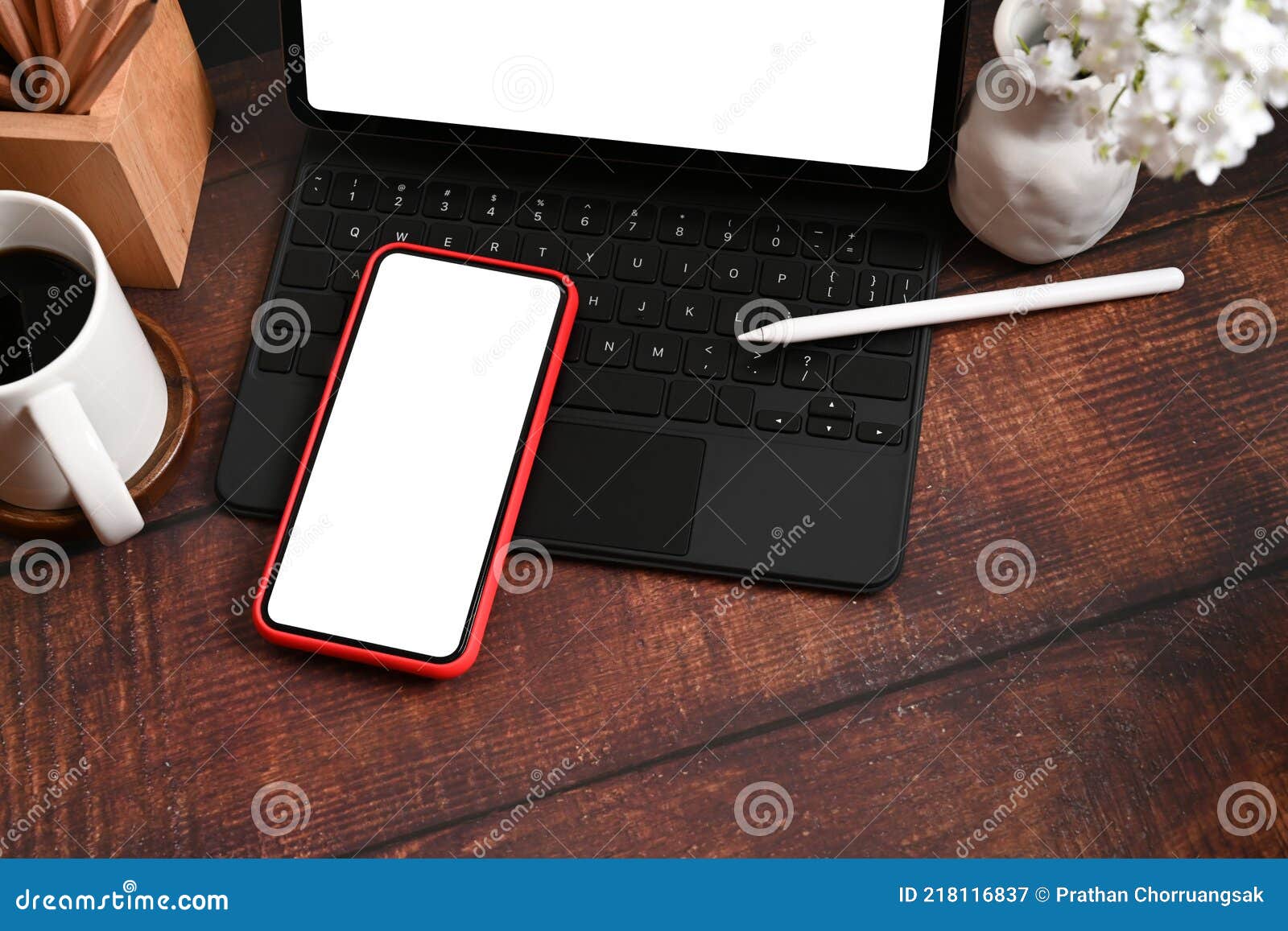 Smart Phone and Computer Tablet with White Screen on Wooden Table ...