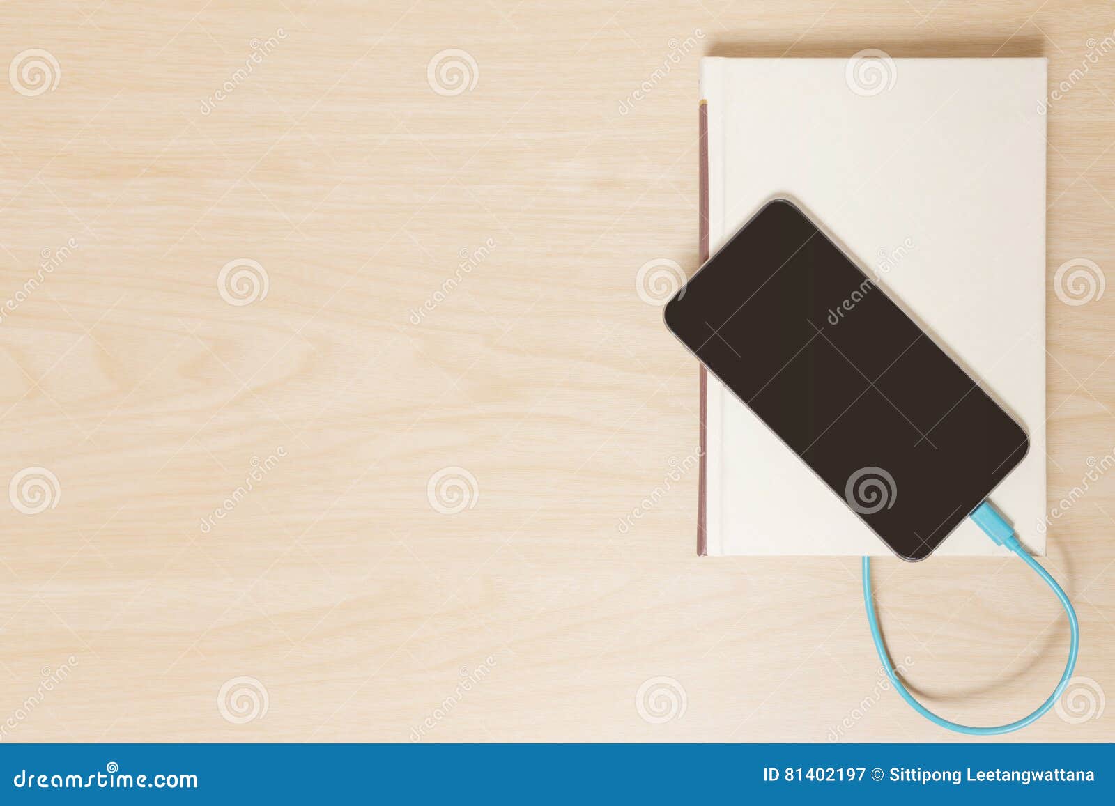 Smart Phone Connected To the Old Book with a Cable Stock Image - Image ...