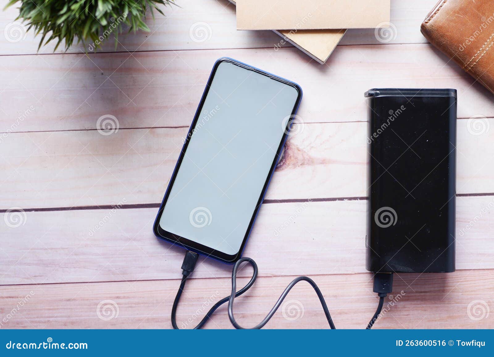 Smart Phone with Empty Screen Charging with Power Bank Top View Stock ...