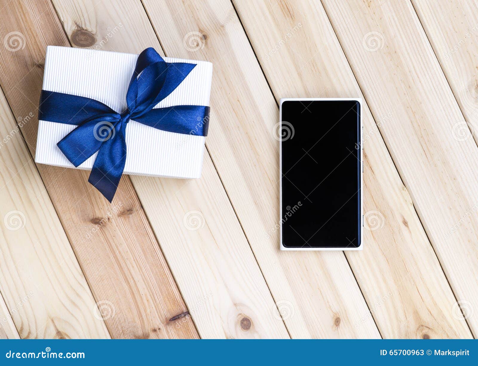 Smart Phone and Gift Box. stock image. Image of cellphone - 65700963