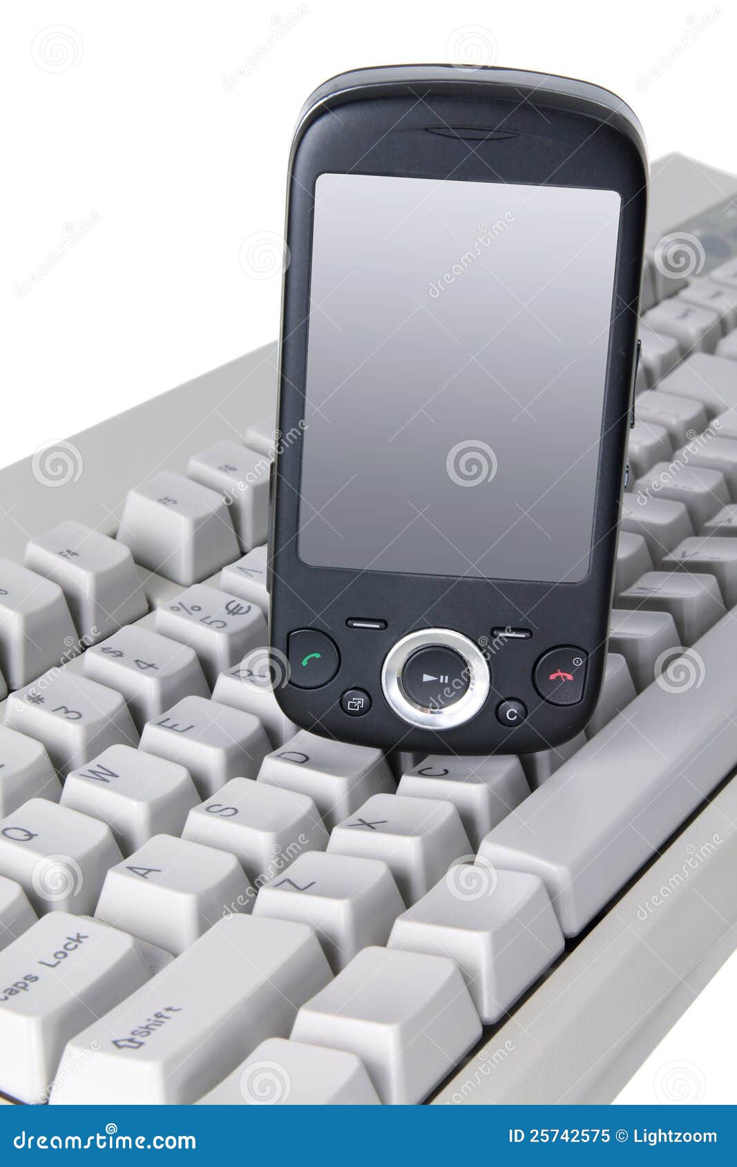 Smart Phone on Keyboard stock image. Image of digital - 25742575