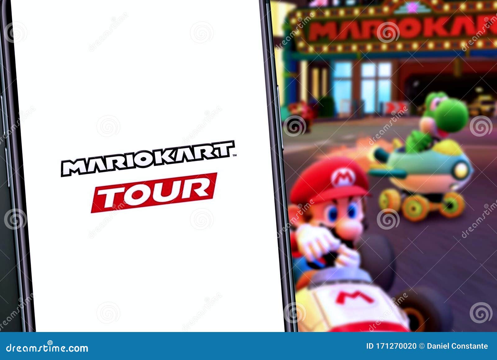 Smart Phone with the MARIO KART TOUR Logo, is a Popular Game for Phones ... Smart Phone with the MARIO KART TOUR Logo, is a Popular Game for Phones ...