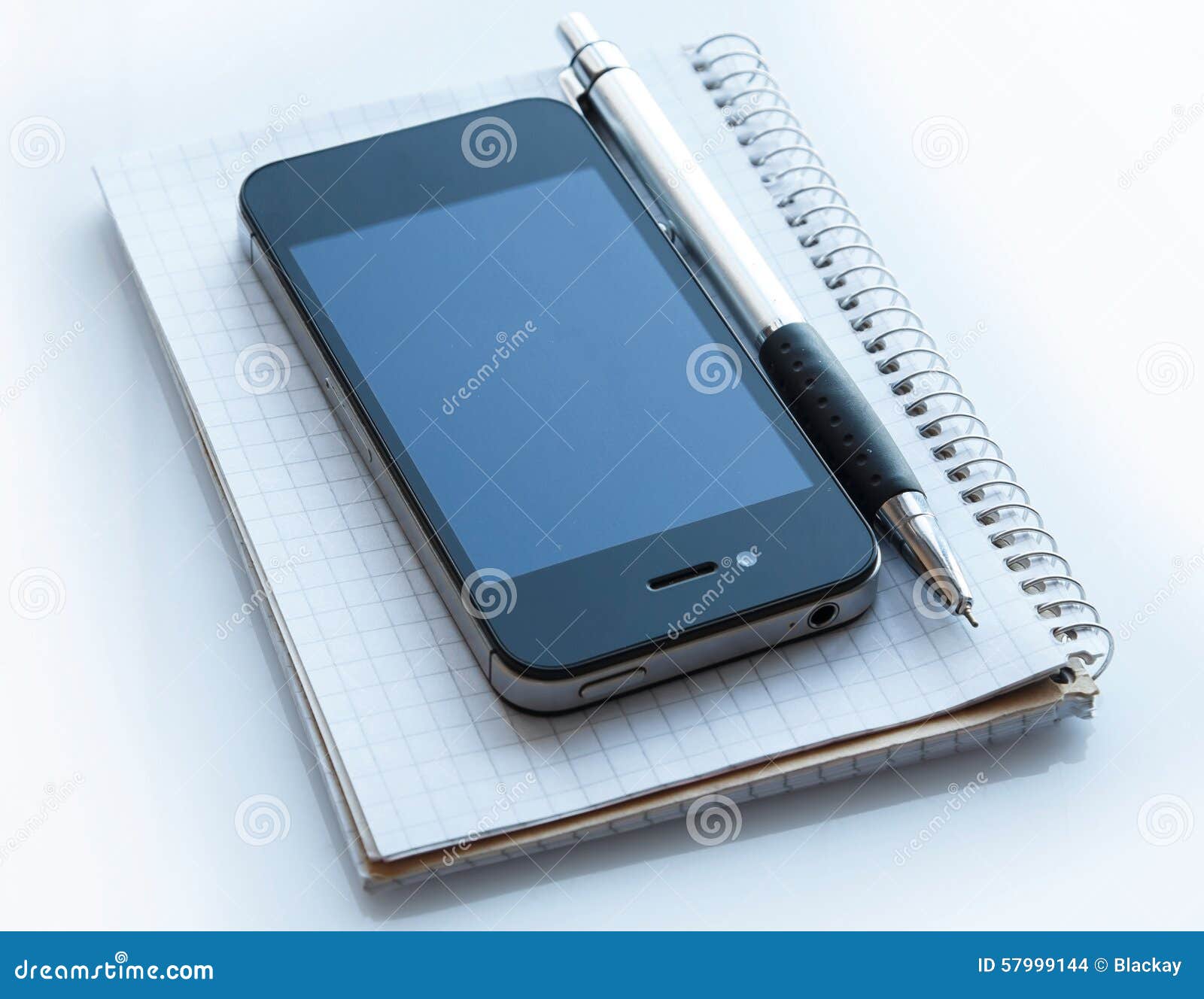 Smart phone and notepad stock photo. Image of communication - 57999144
