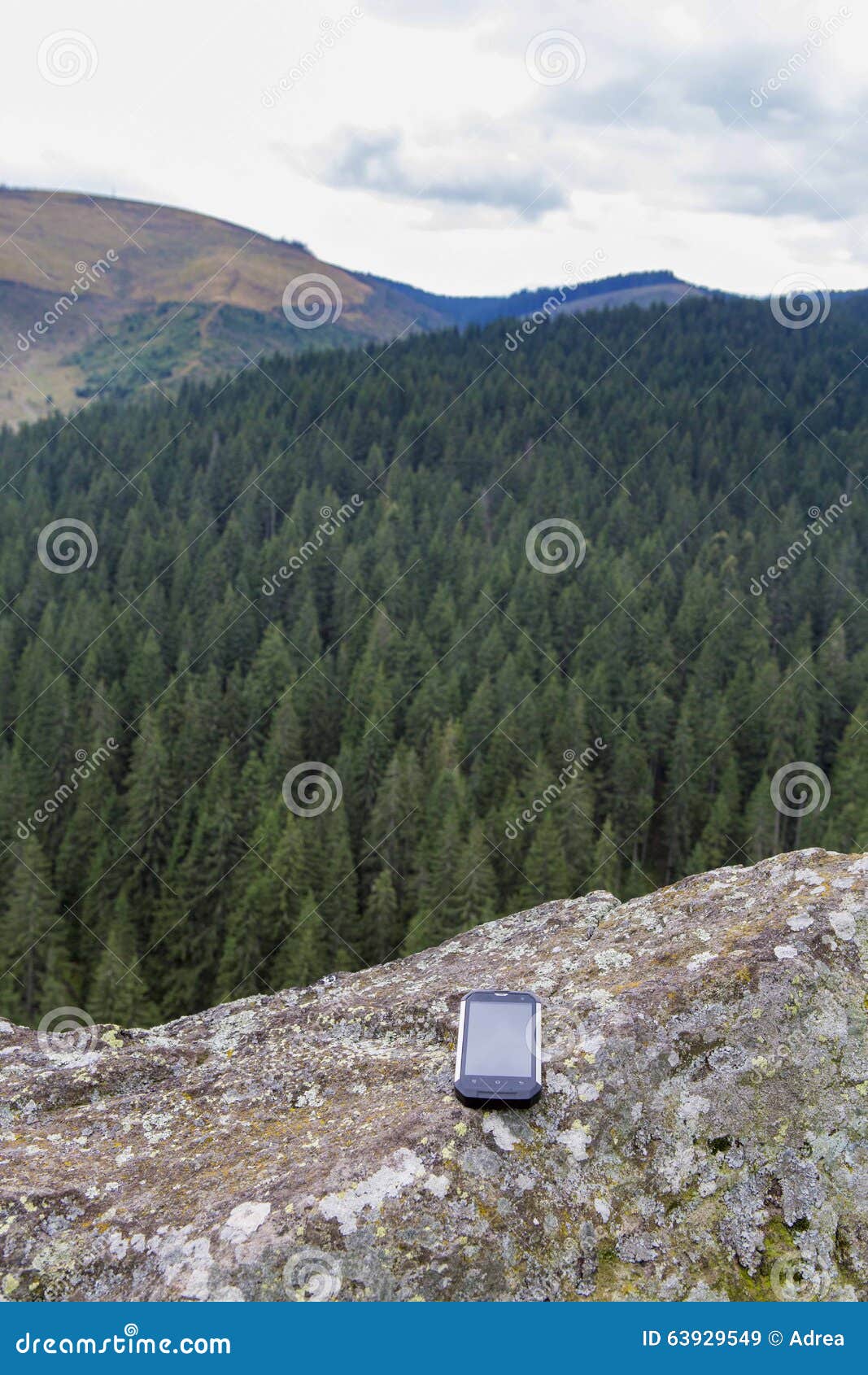 Smartphone on a Rock in a Mountain Landscape. Stock Image - Image of ...