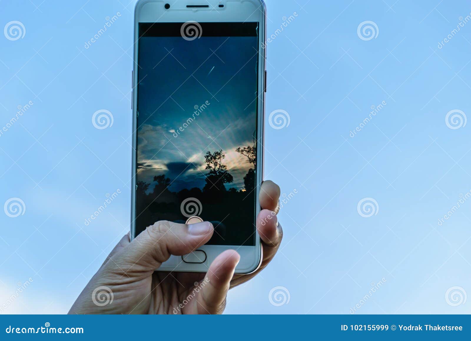 Smart phone shooting stock image. Image of hand, sunny - 102155999