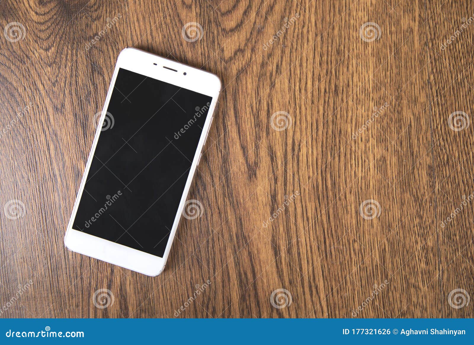 Smart phone on the table stock photo. Image of display - 177321626