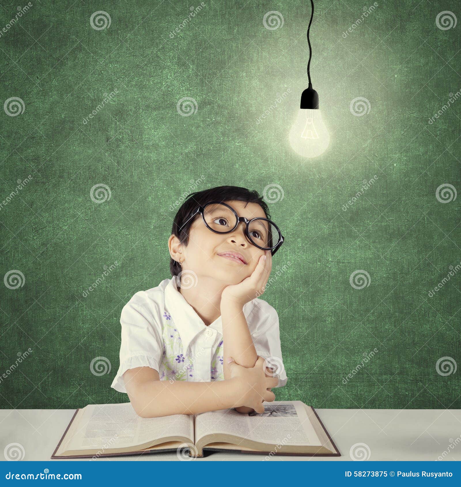 Smart Primary School Student Looking at Light Bulb Stock Image - Image ...