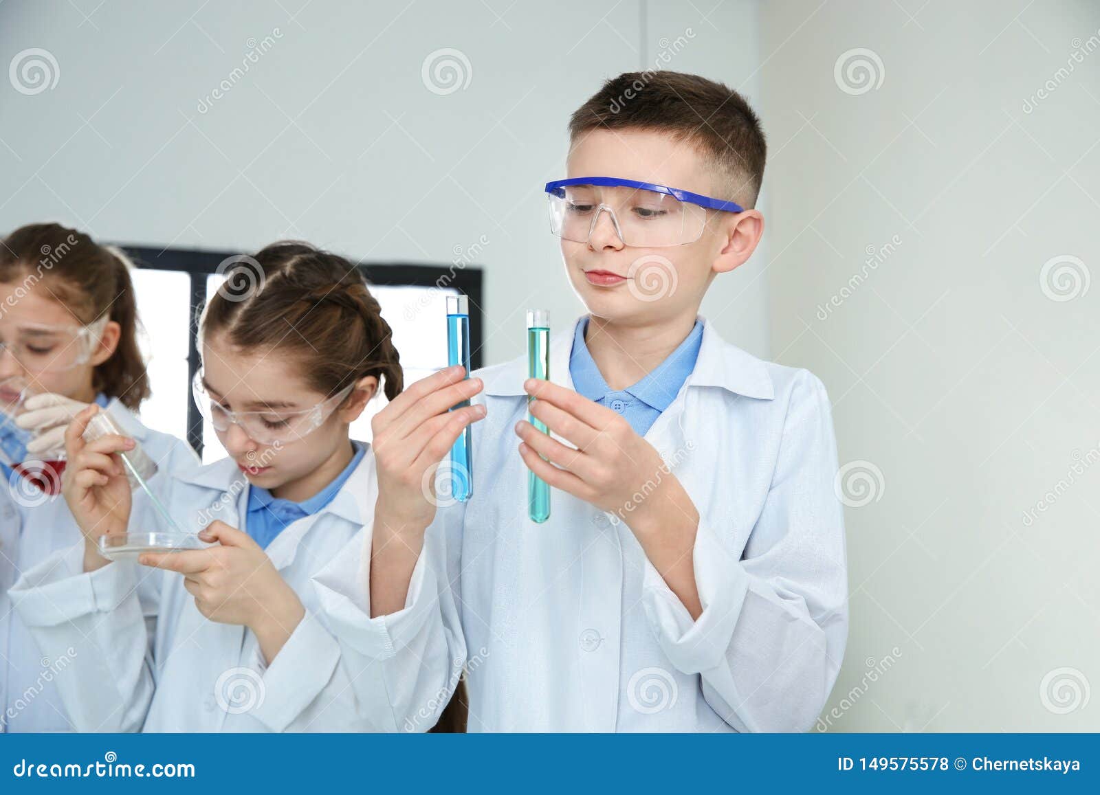 Smart Pupils Making Experiment Royalty-Free Stock Photo | CartoonDealer ...