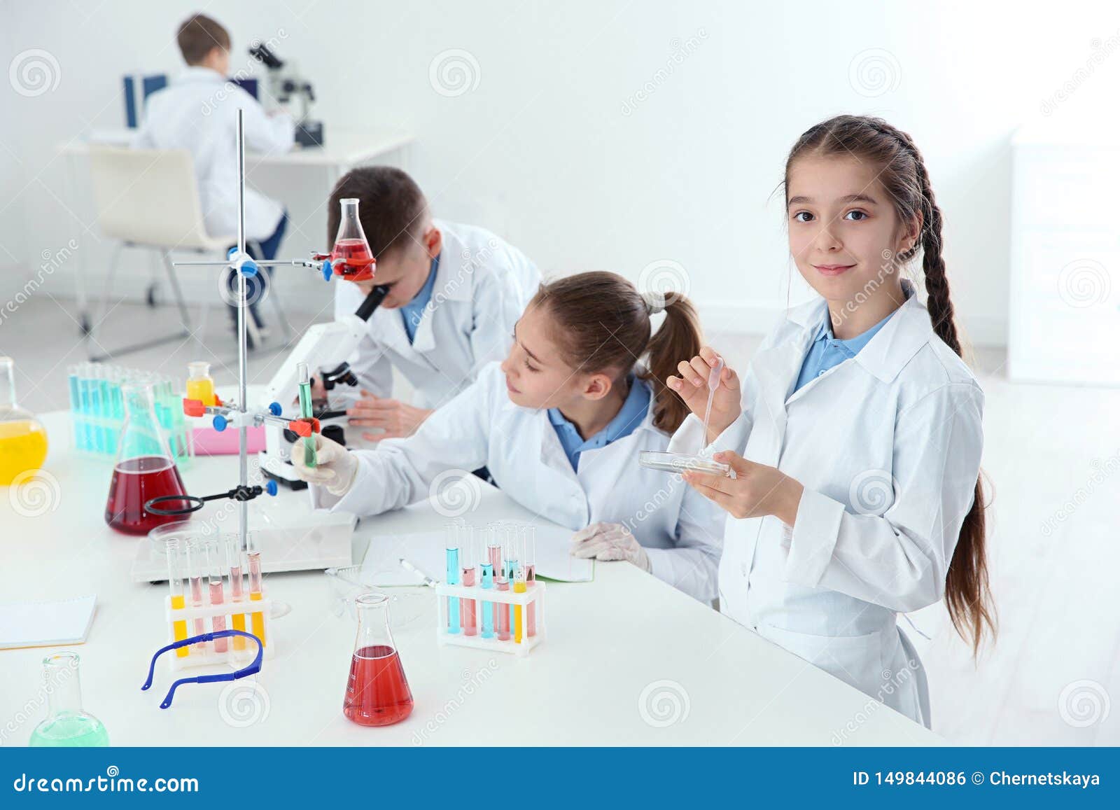 Smart Pupils Making Experiment at Table in Class Stock Photo - Image of ...