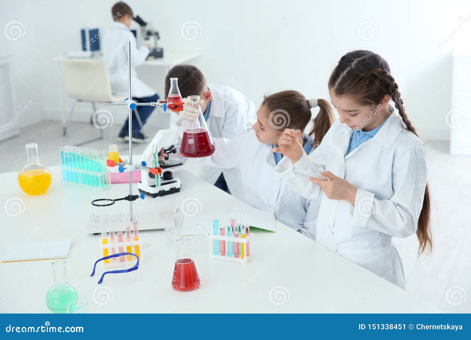 Smart Pupils Making Experiment at Table in Class Stock Image - Image of ...