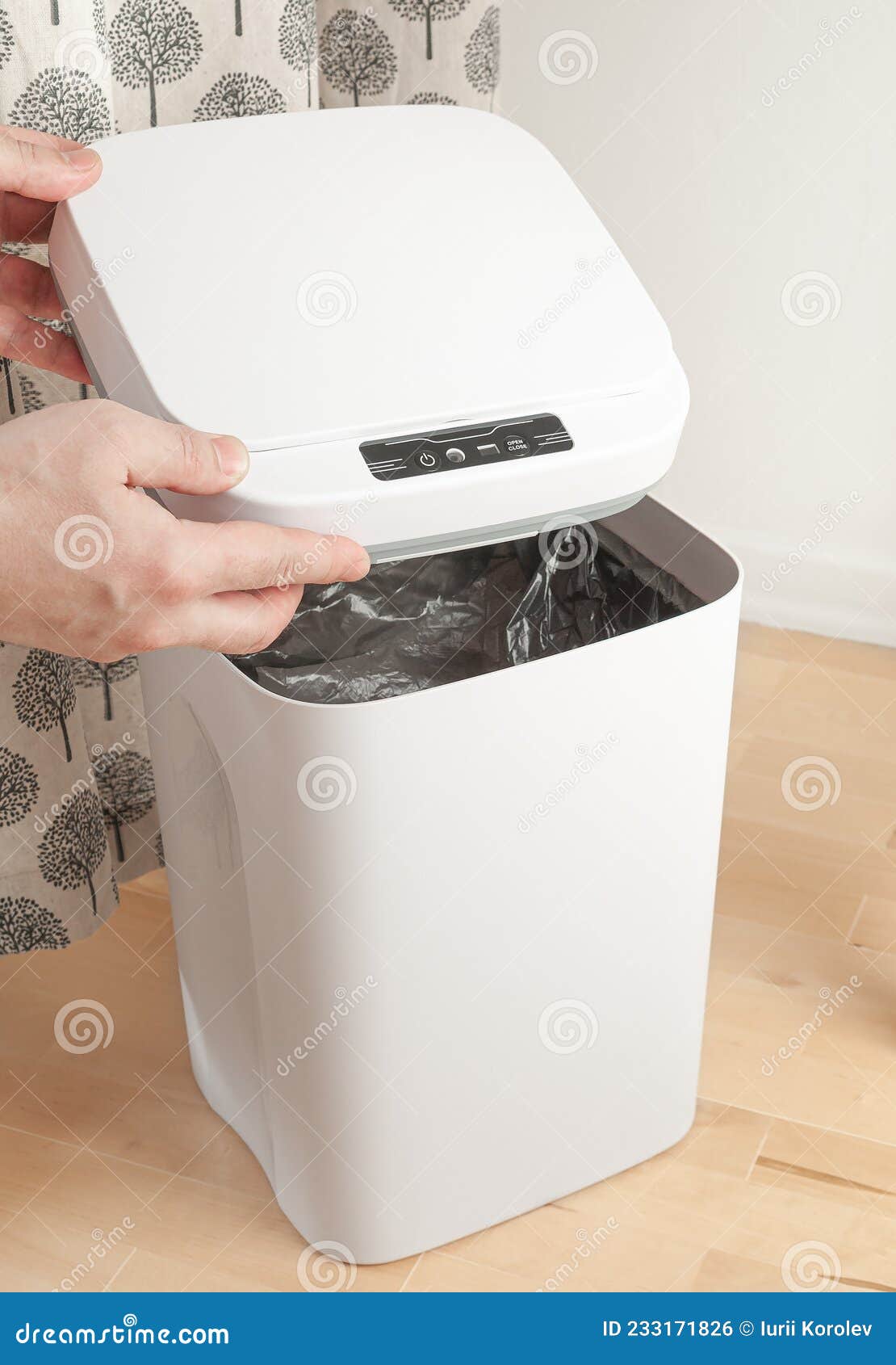 Smart Recycle Bin. Electronic Gadget for Home and Office. a Man`s Hand ...