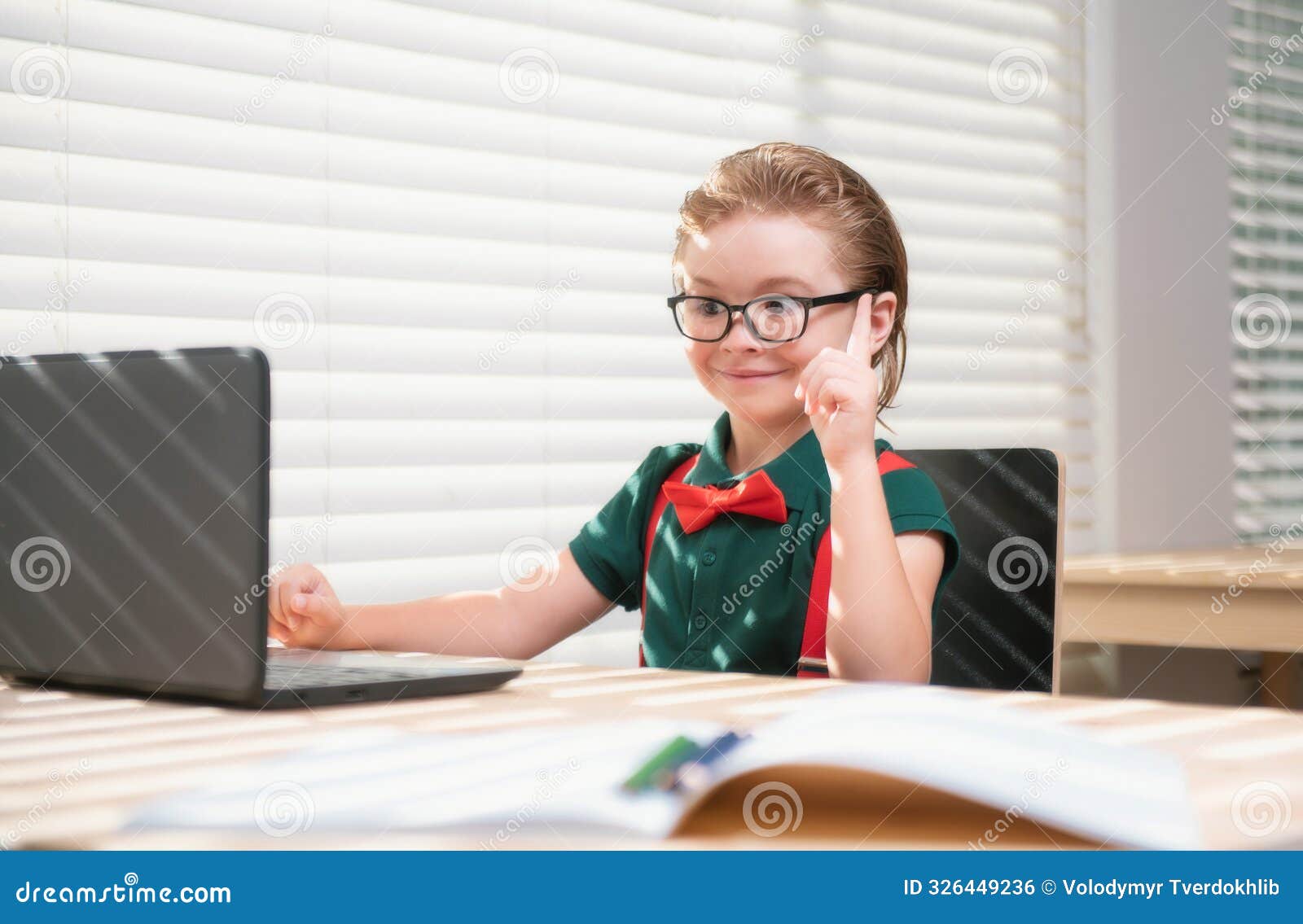 Smart School Boy at Home Writing Homework. Little Student with Notebook ...