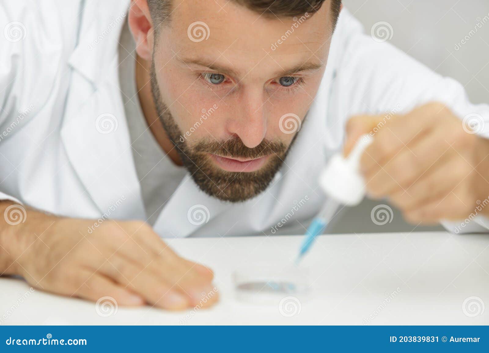 Smart Scientist Man Tests Liquid Substance in Test Tube Stock Image ...
