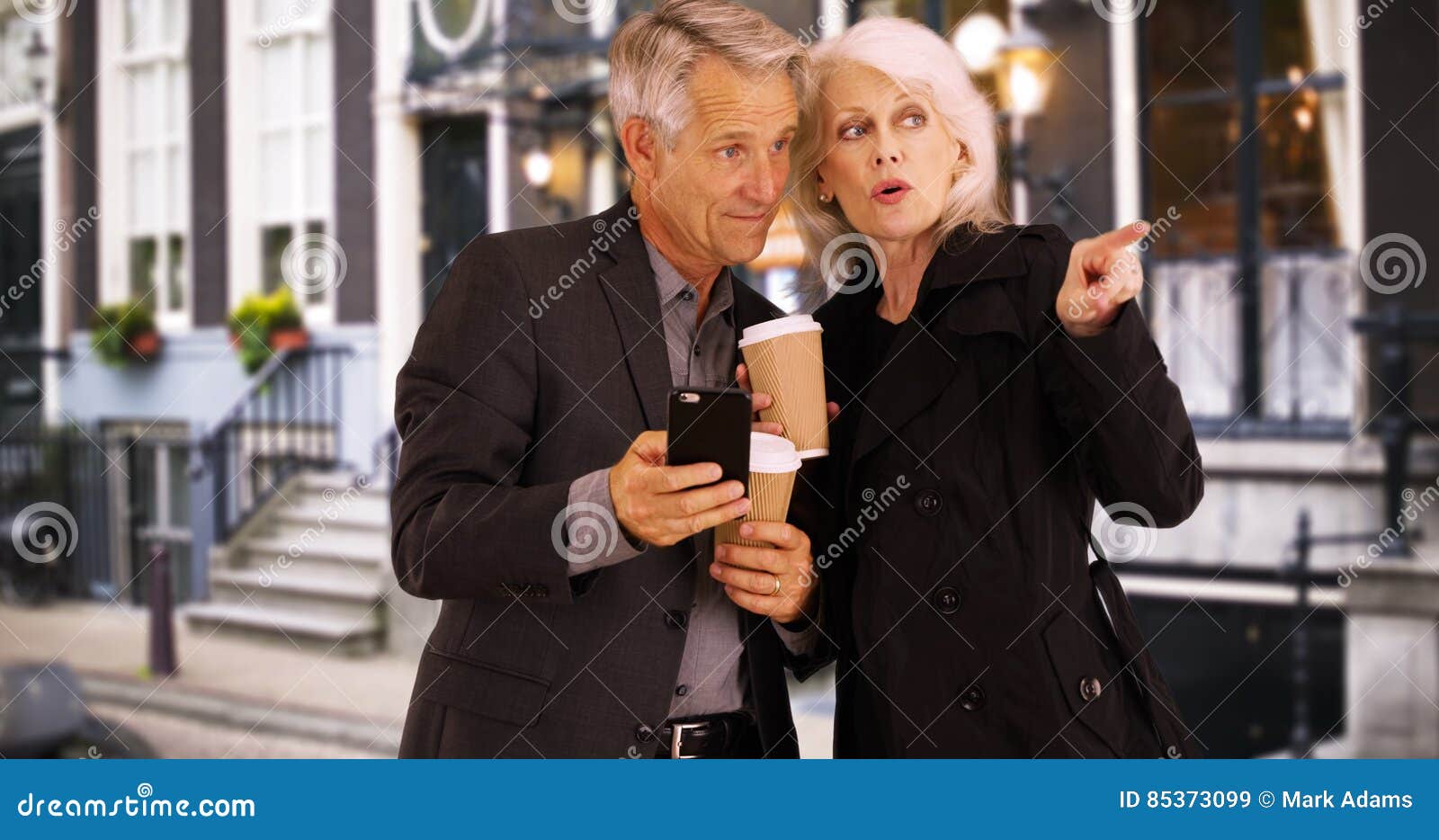 Smart Seniors Using Smartphone To Find Their Way Home Stock Image ...
