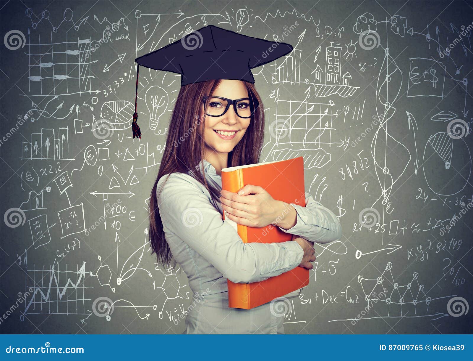 Smart Student with Graduation Cap Over Math Science Formulas Blackboard ...