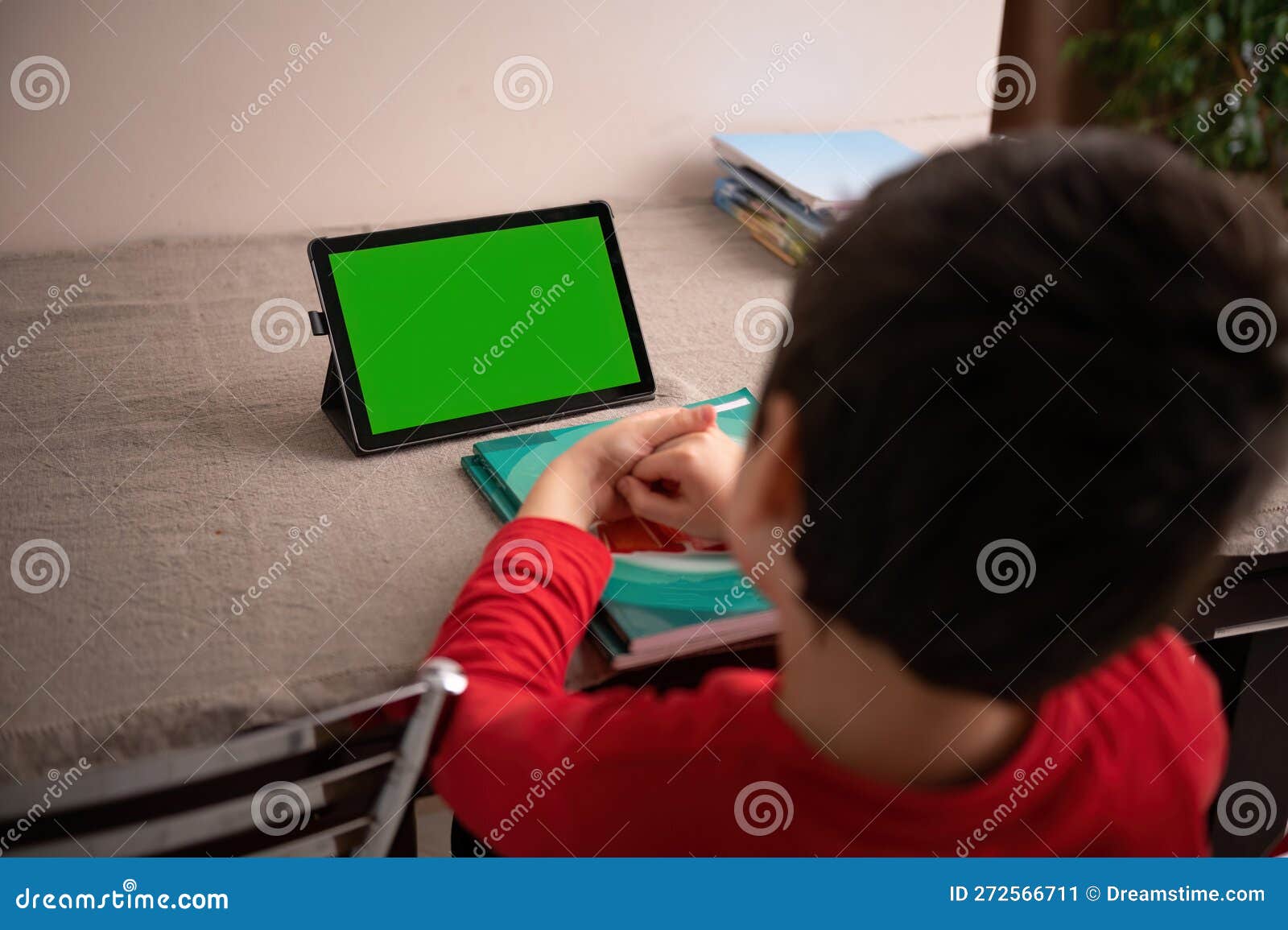 Smart Student Sitting a Table a Watching Online Lesson on a Digital ...