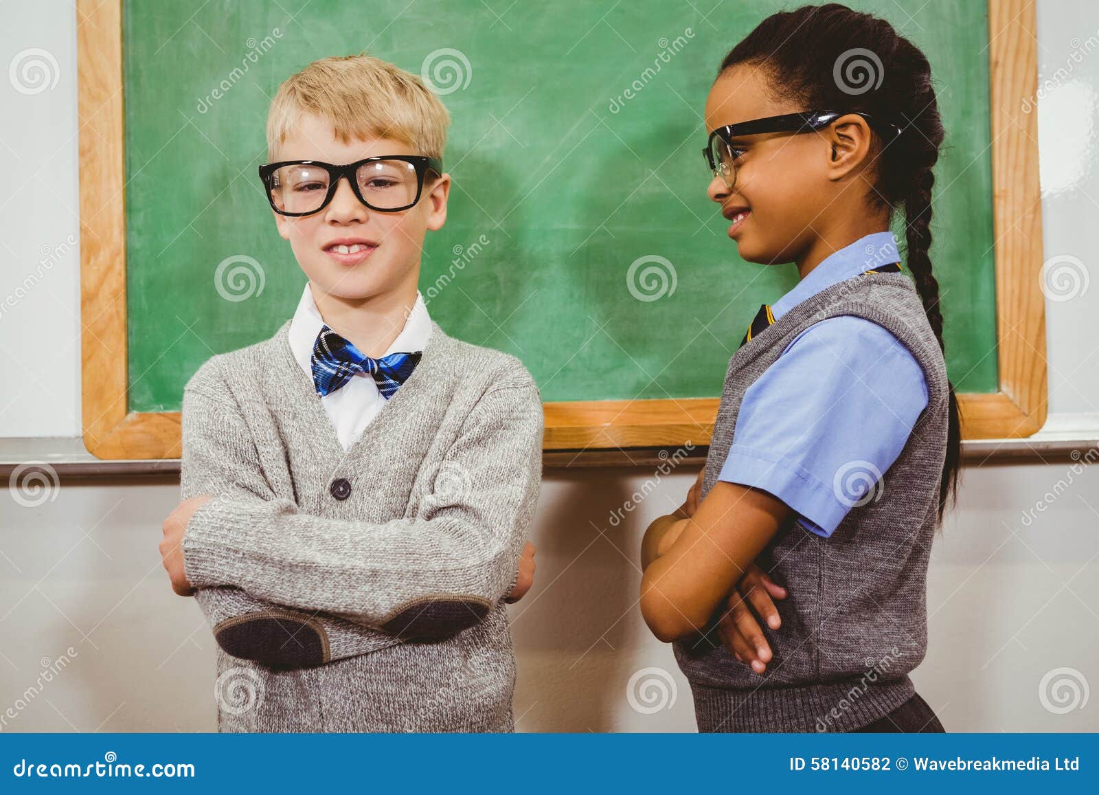 Smart Students Standing in Front of a Blackboard Stock Photo - Image of ...