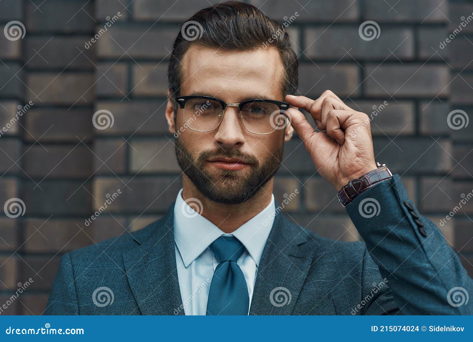 Smart And Successful Confident Businessman In Formal Wear Adjusting