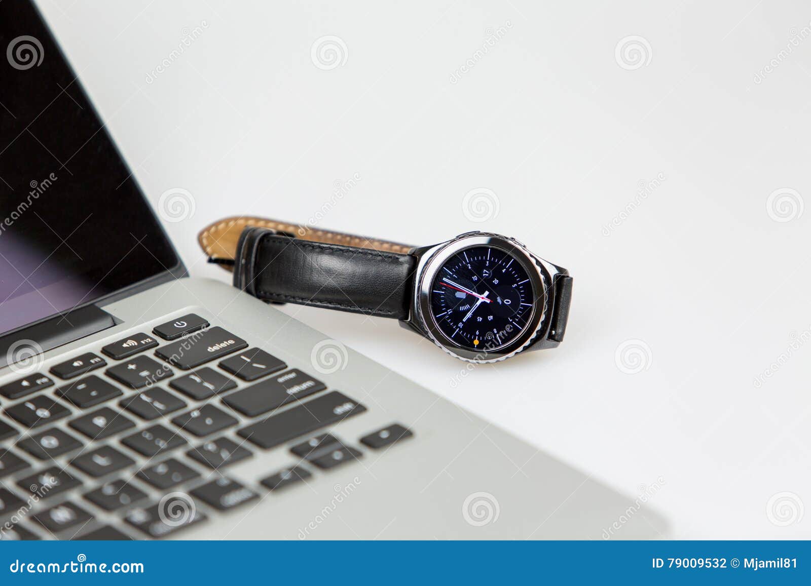 Smart watch and laptop stock photo. Image of screen, macbook - 79009532