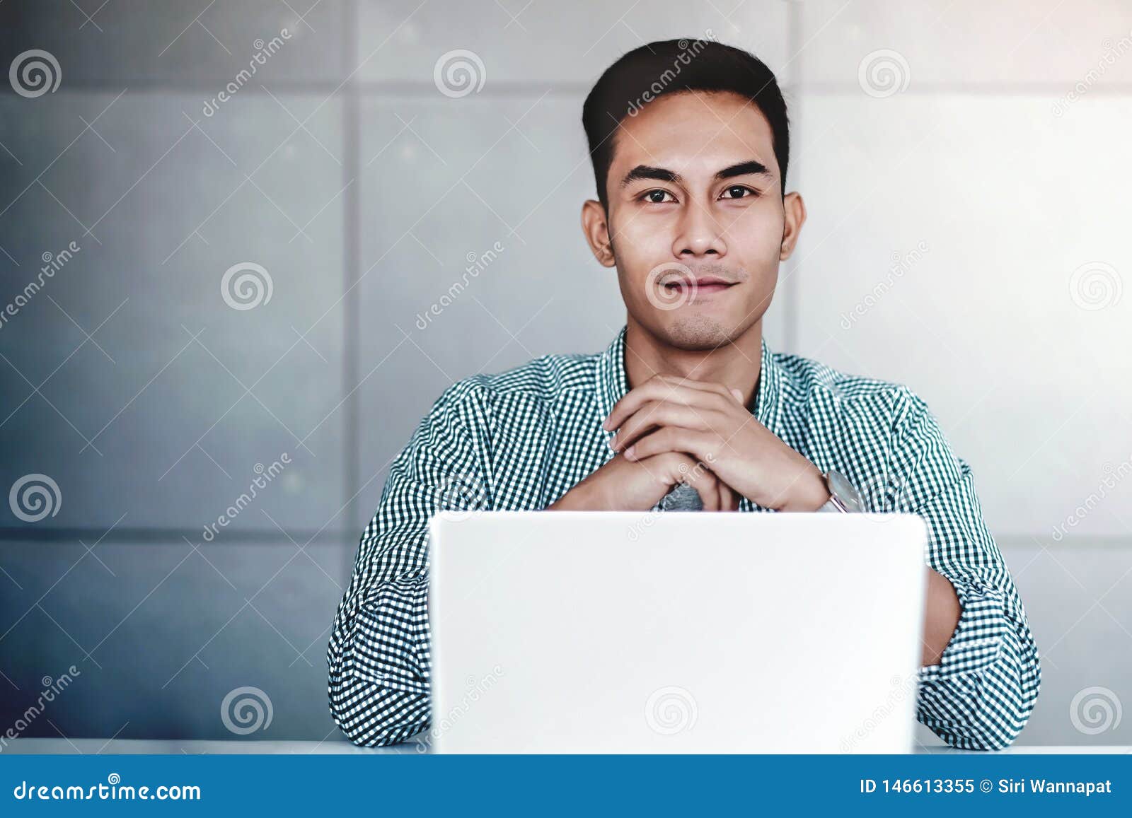Smart Young Asian Businessman Working on Computer Laptop in Office ... Smart Young Asian Businessman Working on Computer Laptop in Office ...