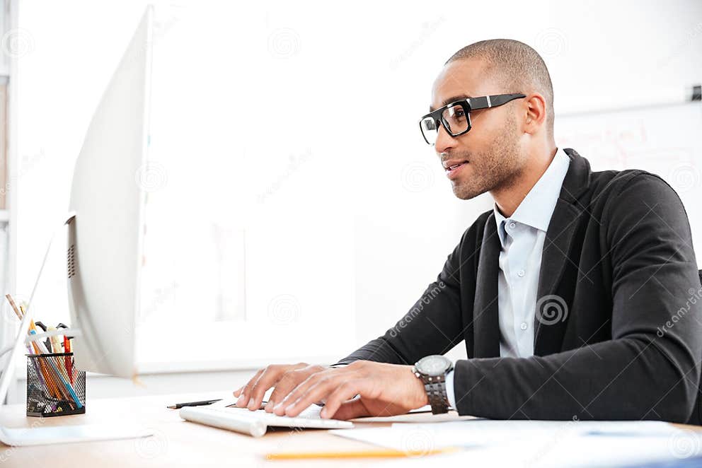Smart Young Businessman Looking at the Computer Stock Photo - Image of ...
