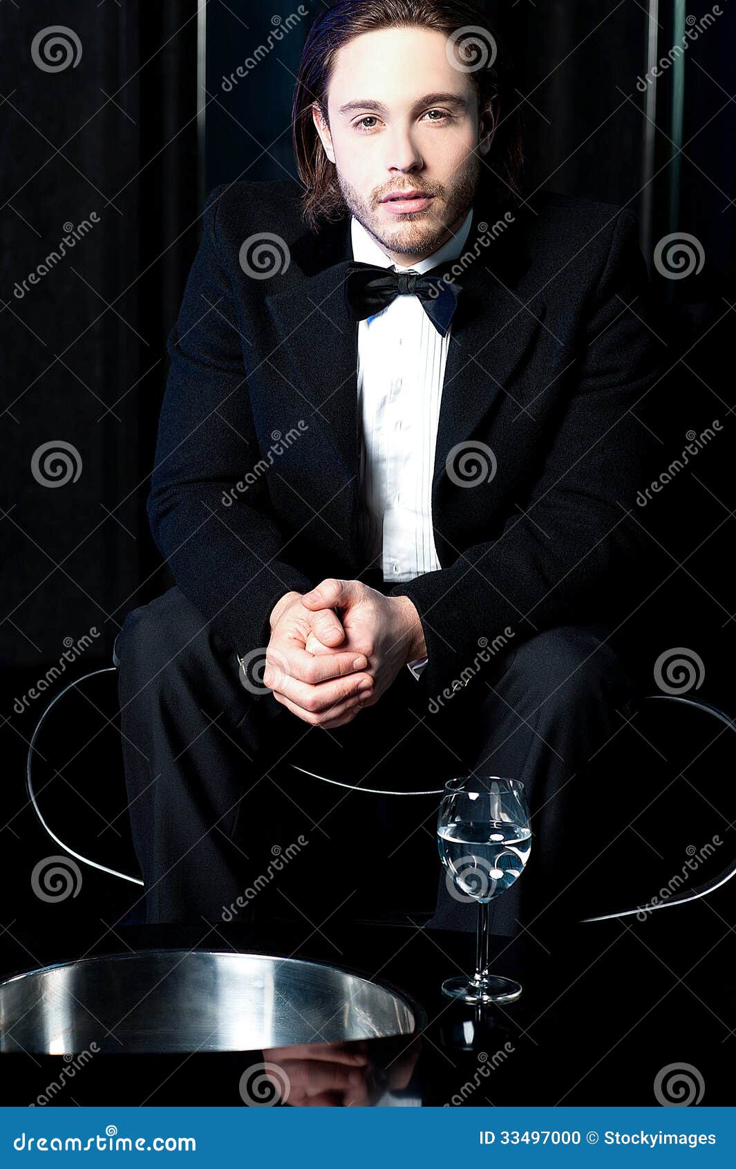 Smart young guy at a party stock photo. Image of dashing - 33497000