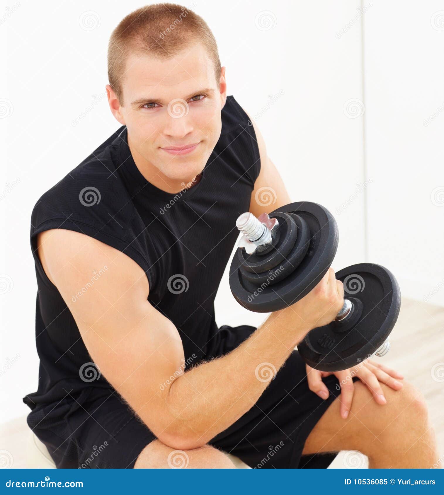 Smart Young Man Exercising with a Dumbbell Stock Image - Image of ...